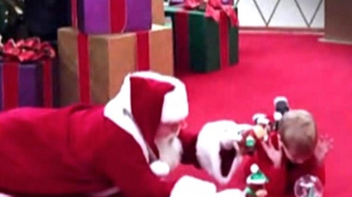 Santa gets on child’s level during NC autism event | Raleigh News ...