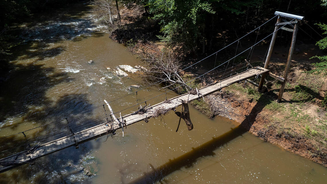 Drone: Chantal causes significant damage to pedestrian bridge in Eno ...